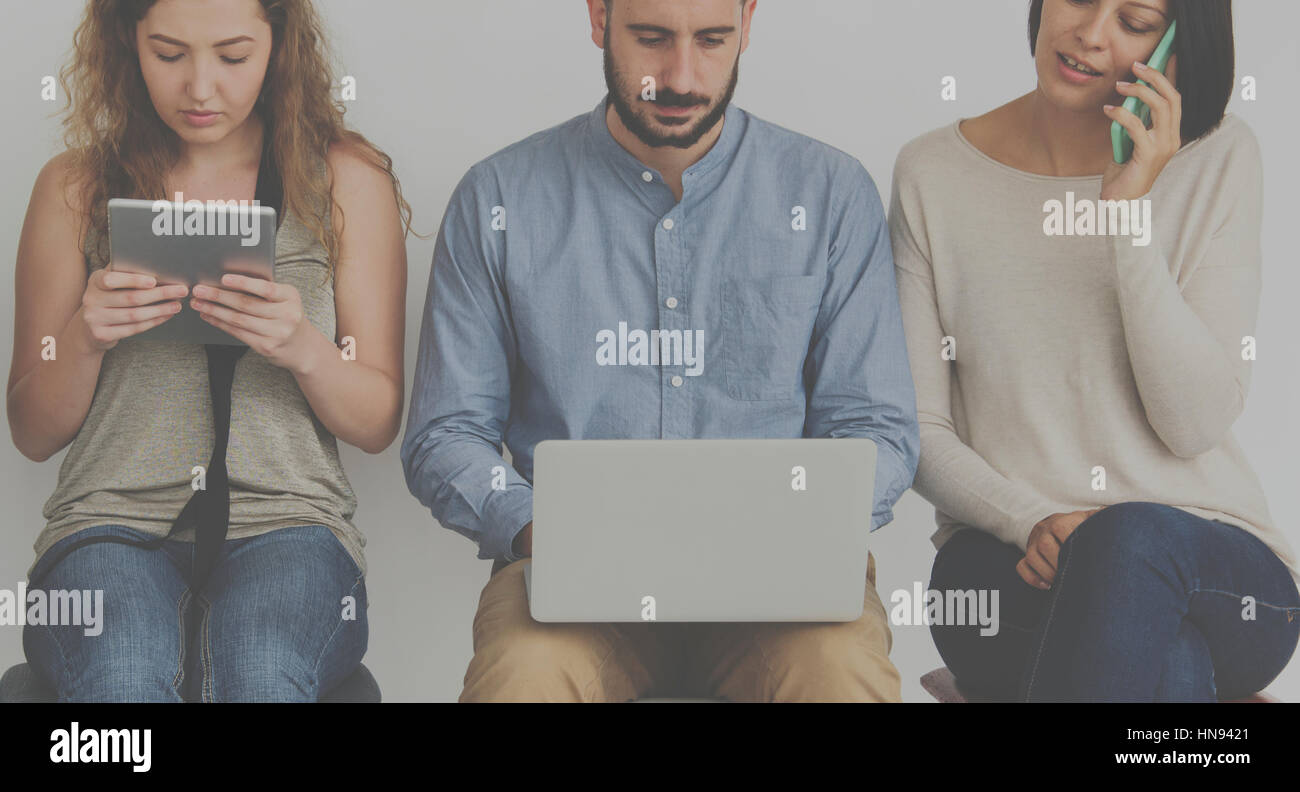 Diverse group of people with electronic devices Stock Photo - Alamy