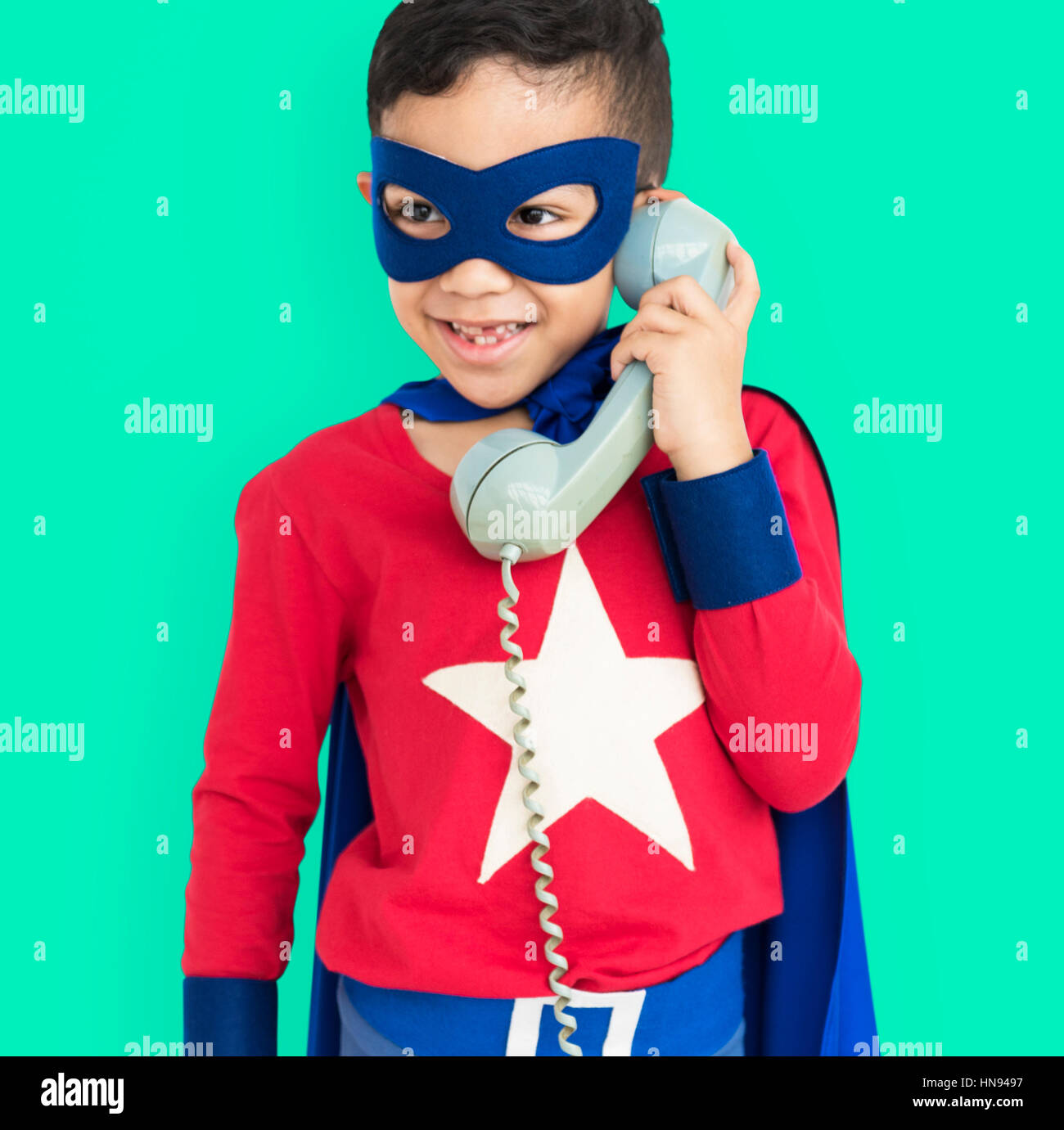 Superhero Boy with Telephone Concept Stock Photo - Alamy