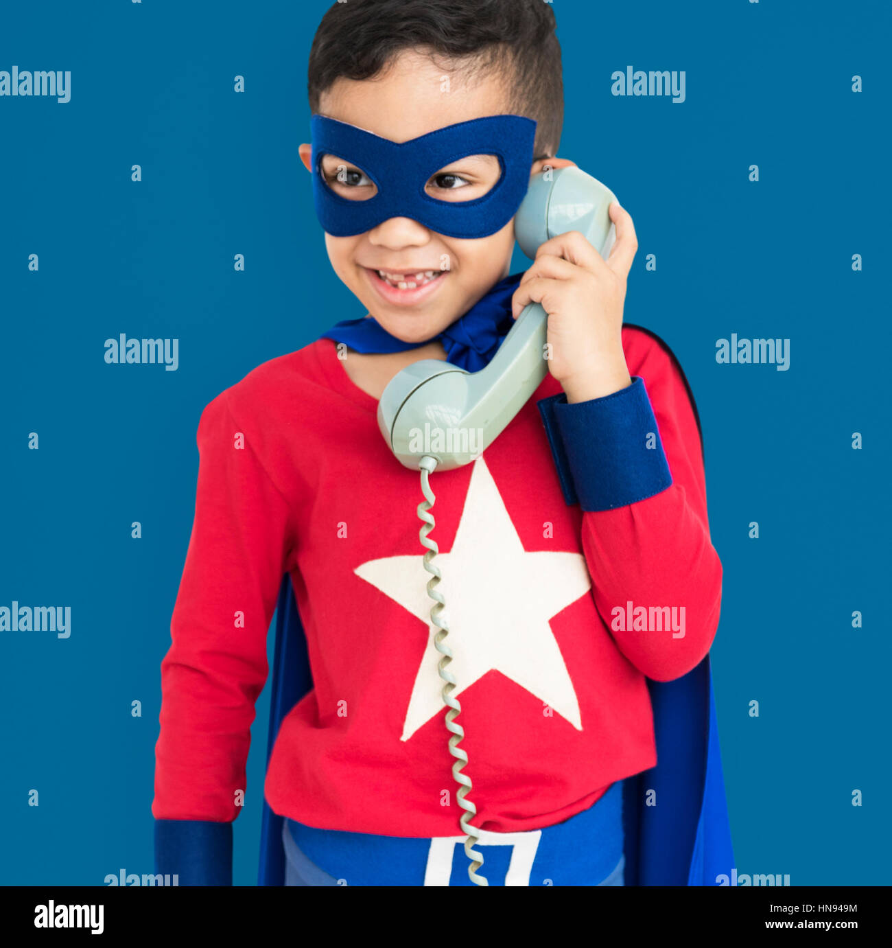 Superhero Boy with Telephone Concept Stock Photo - Alamy