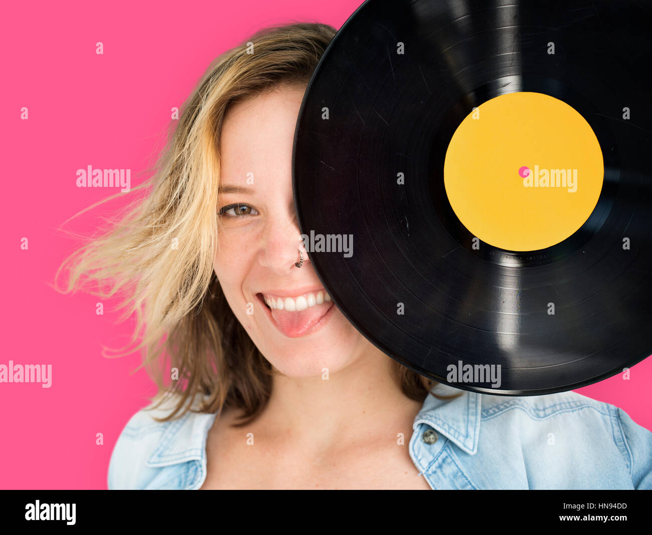 Female holding vinyl plate hi-res stock photography and images - Alamy
