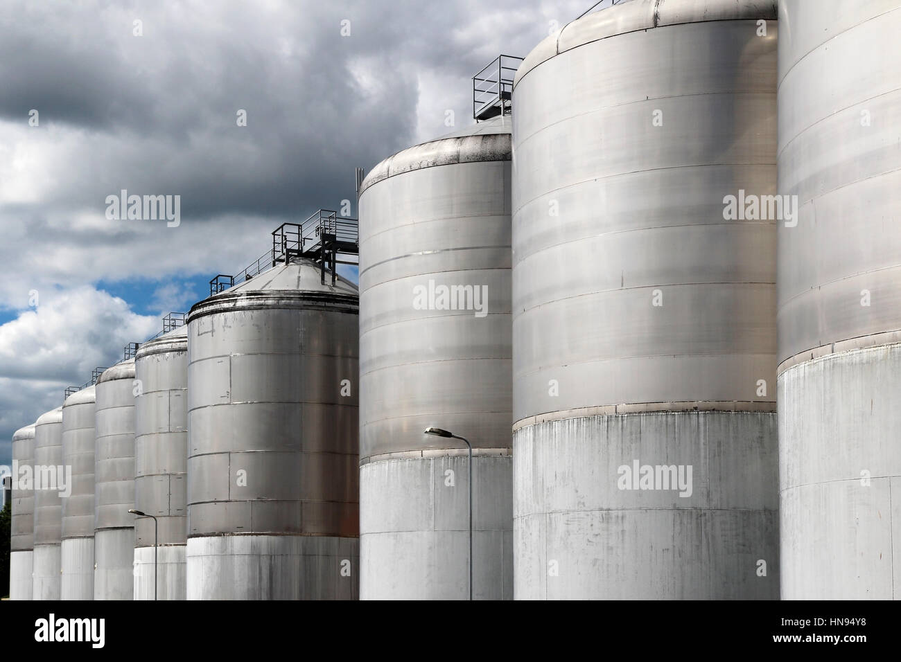 large stainless steel fermentation vessel under cloudy sky Stock Photo ...