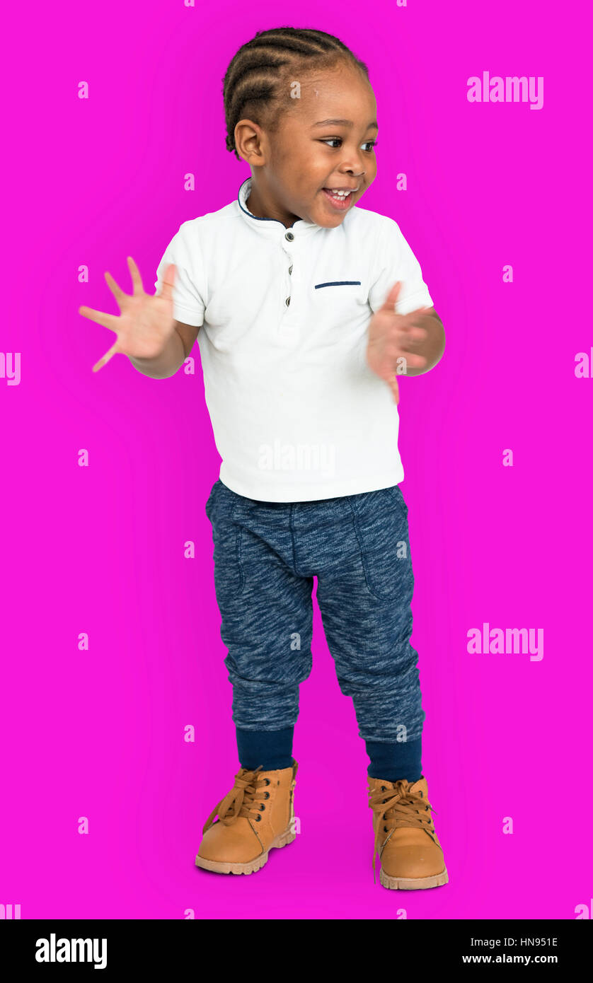 Kid Pose Standing Studio Concept Stock Photo - Alamy