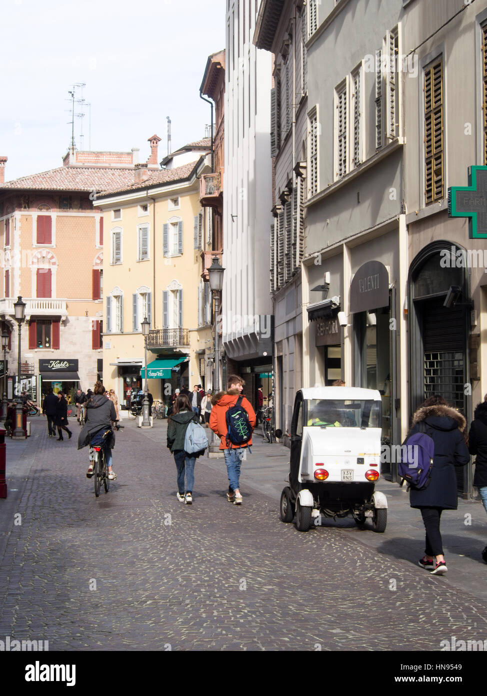 Post office electric car circulating in the limited traffic city center ...