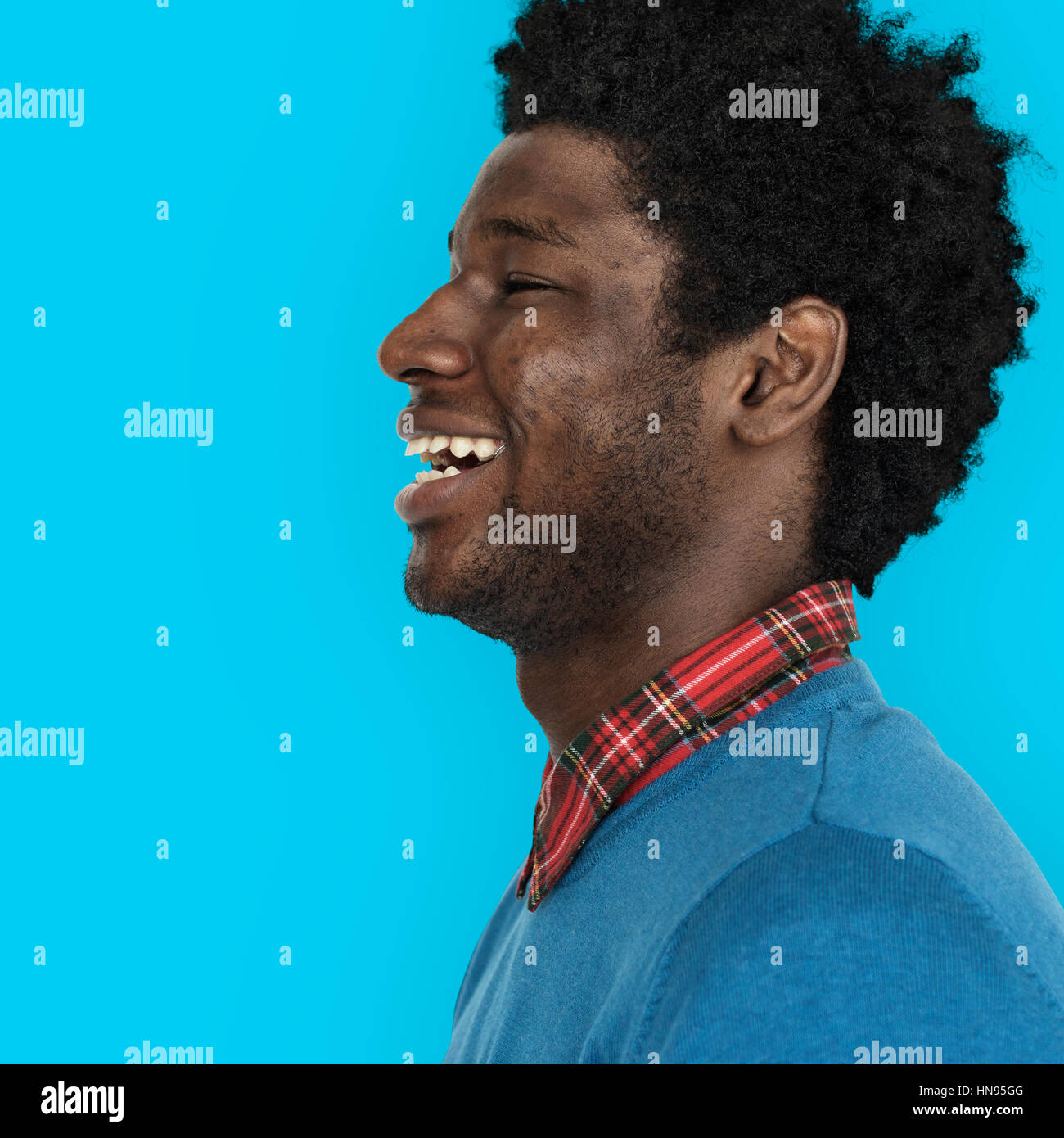 African Descent Man Smiling Side Concept Stock Photo - Alamy