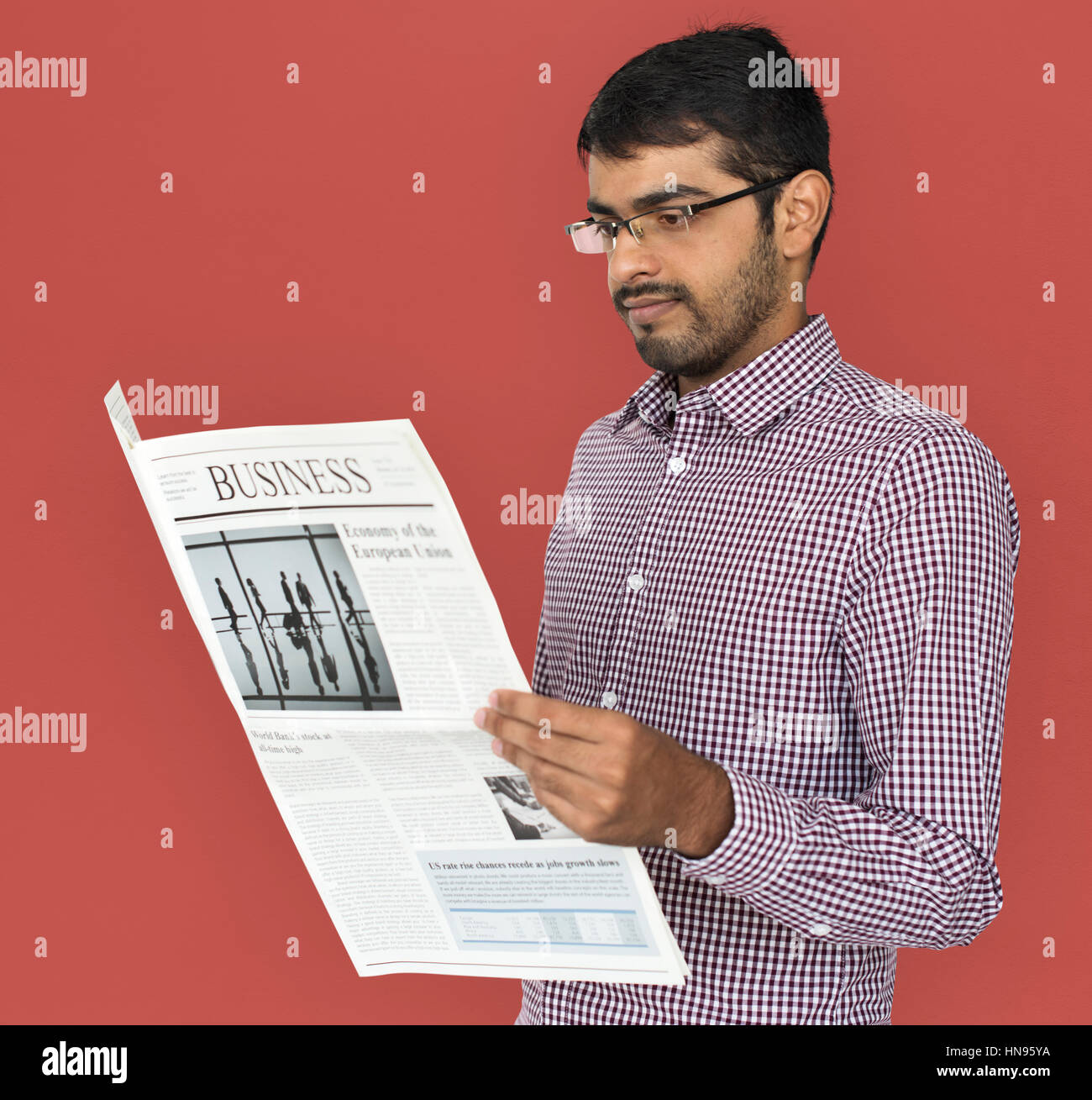 Indian man reading hi-res stock photography and images - Alamy