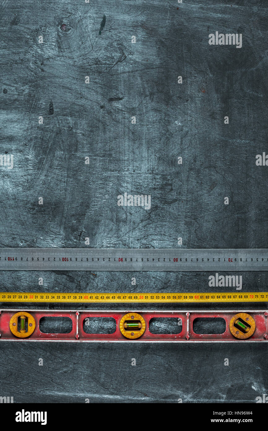 Yellow construction level on a white background Stock Photo - Alamy