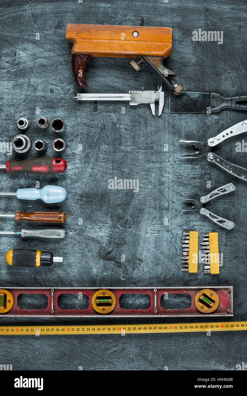 The set of construction tools on wooden background Stock Photo - Alamy