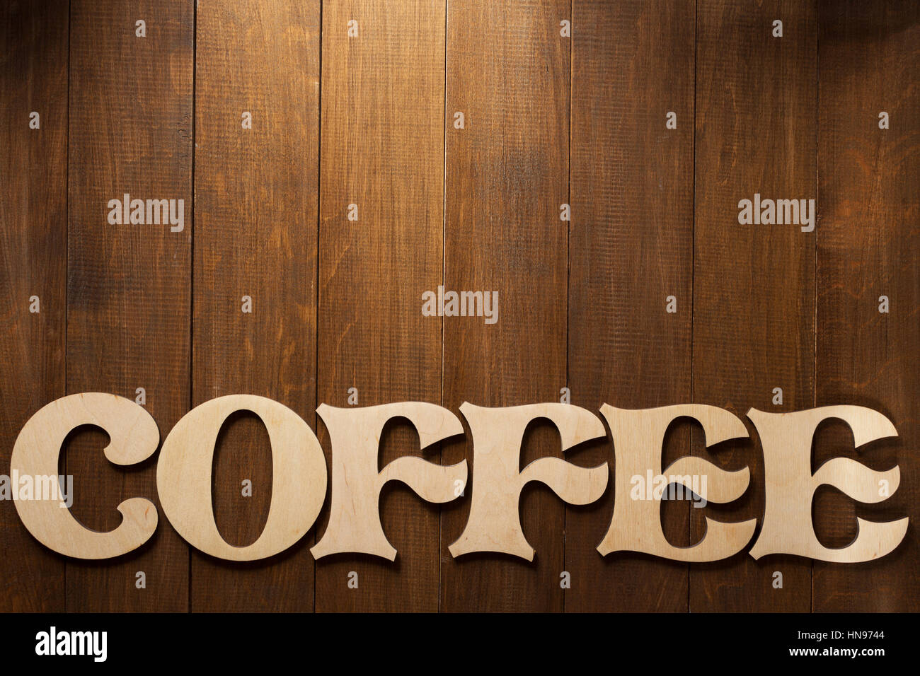 coffee letters on wooden background Stock Photo - Alamy