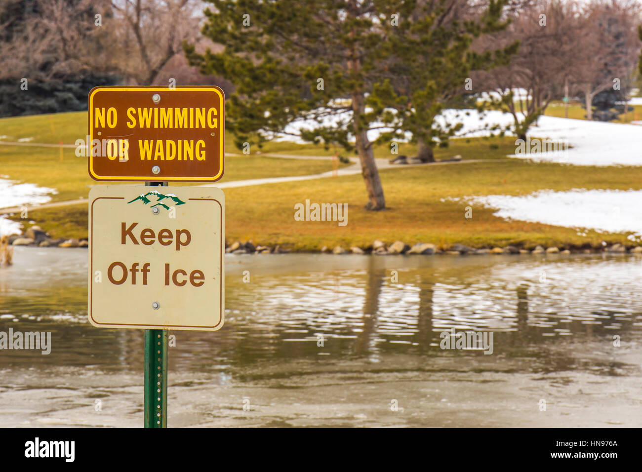 No Swimming & Keep Off Ice Sign In Winter Stock Photo - Alamy