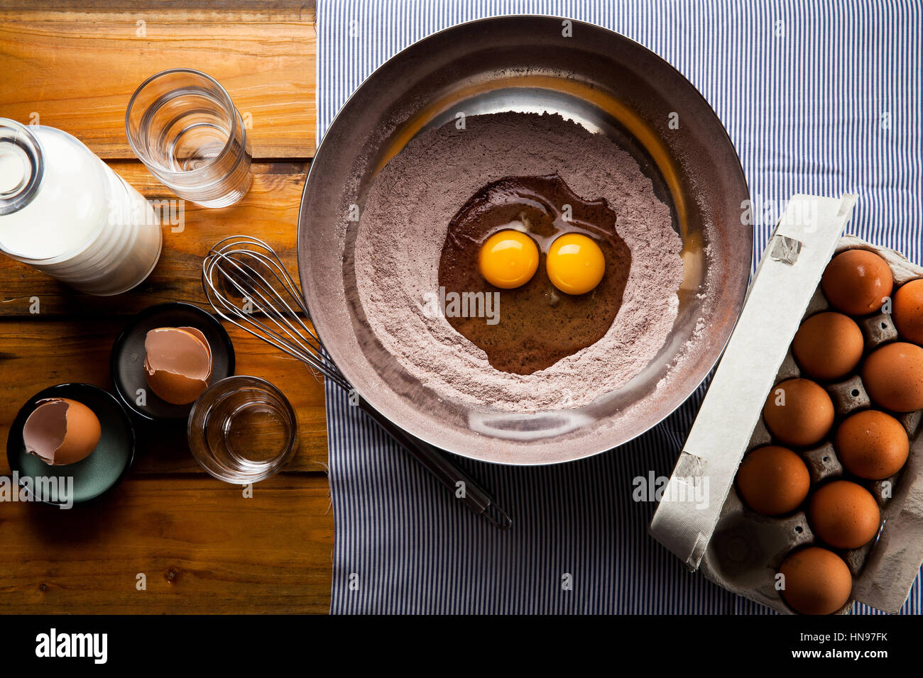 preparation of eggs on the wooden table Stock Photo - Alamy