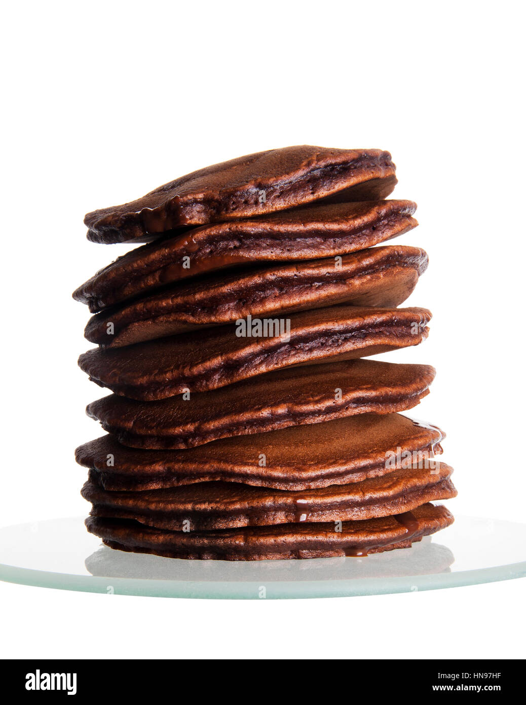 Stack of Small Chocolate Pancakes on white background Stock Photo - Alamy