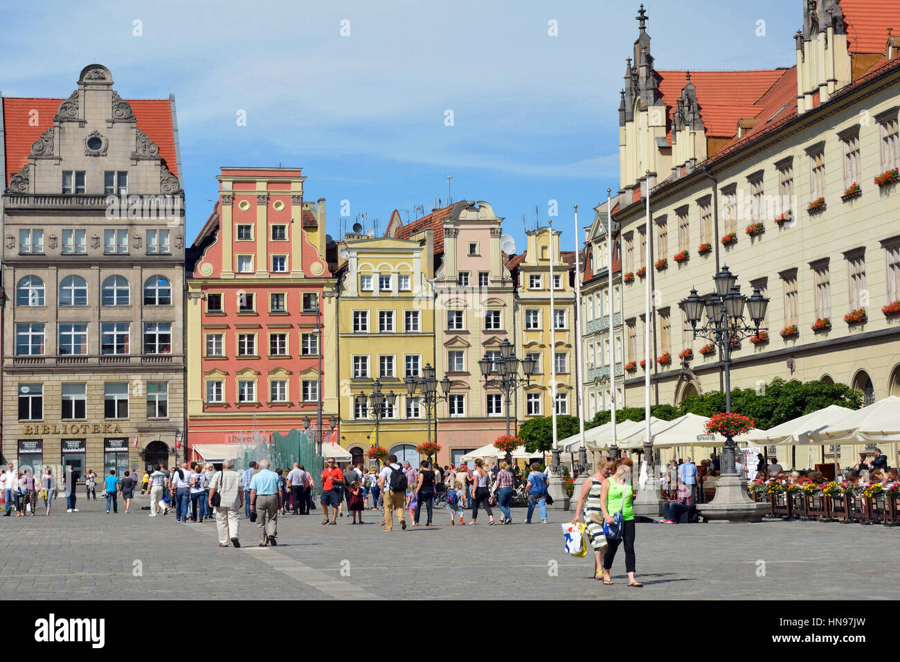 People walking in the Market Square in the historical Old Town of ...