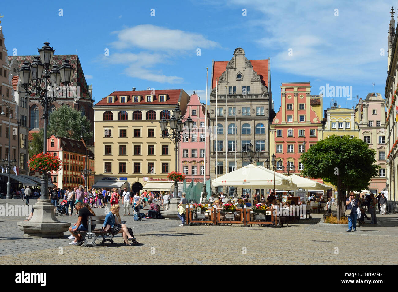 People walking in the Market Square in the historical Old Town of ...