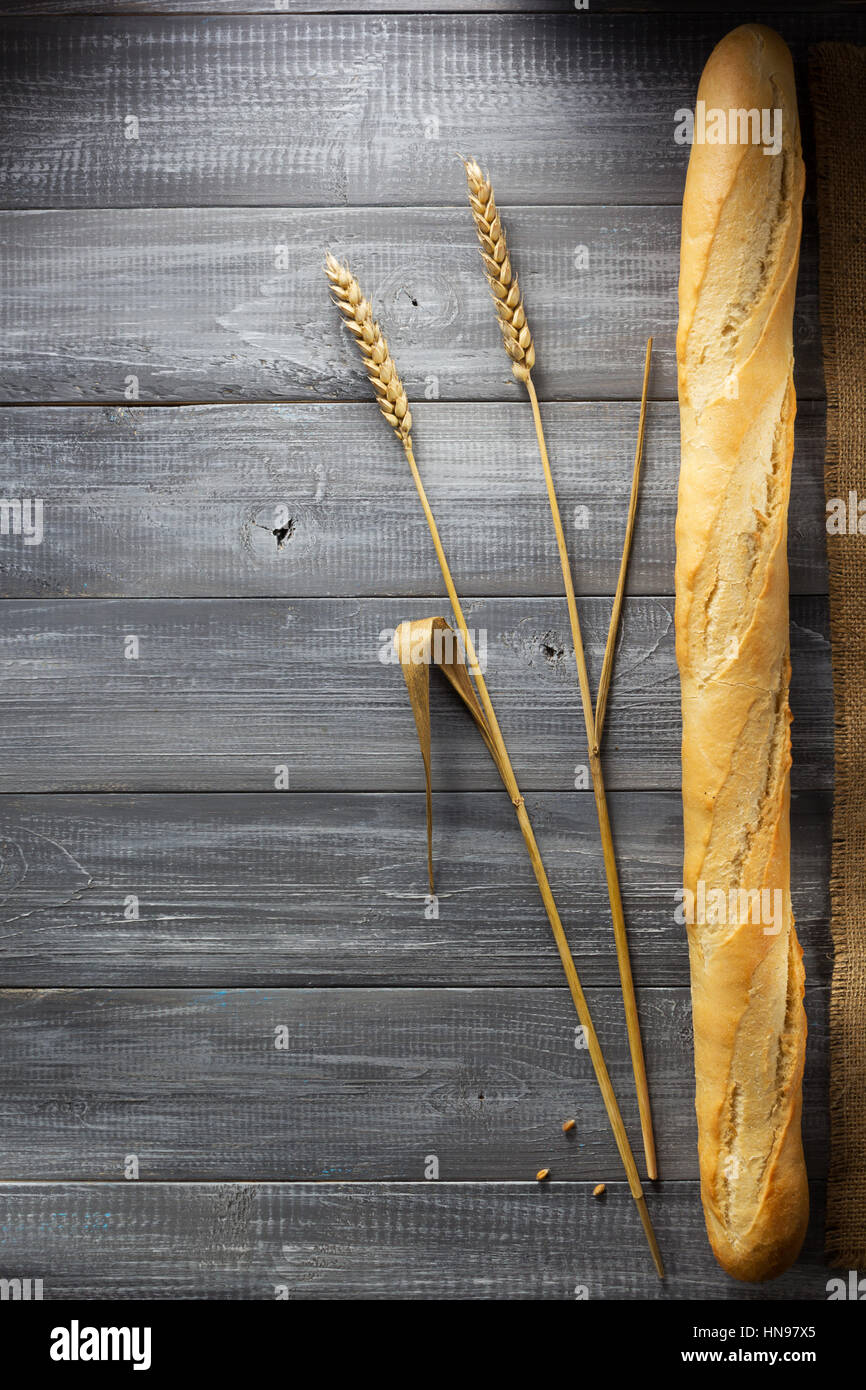 bread and bakery products on wood background Stock Photo - Alamy