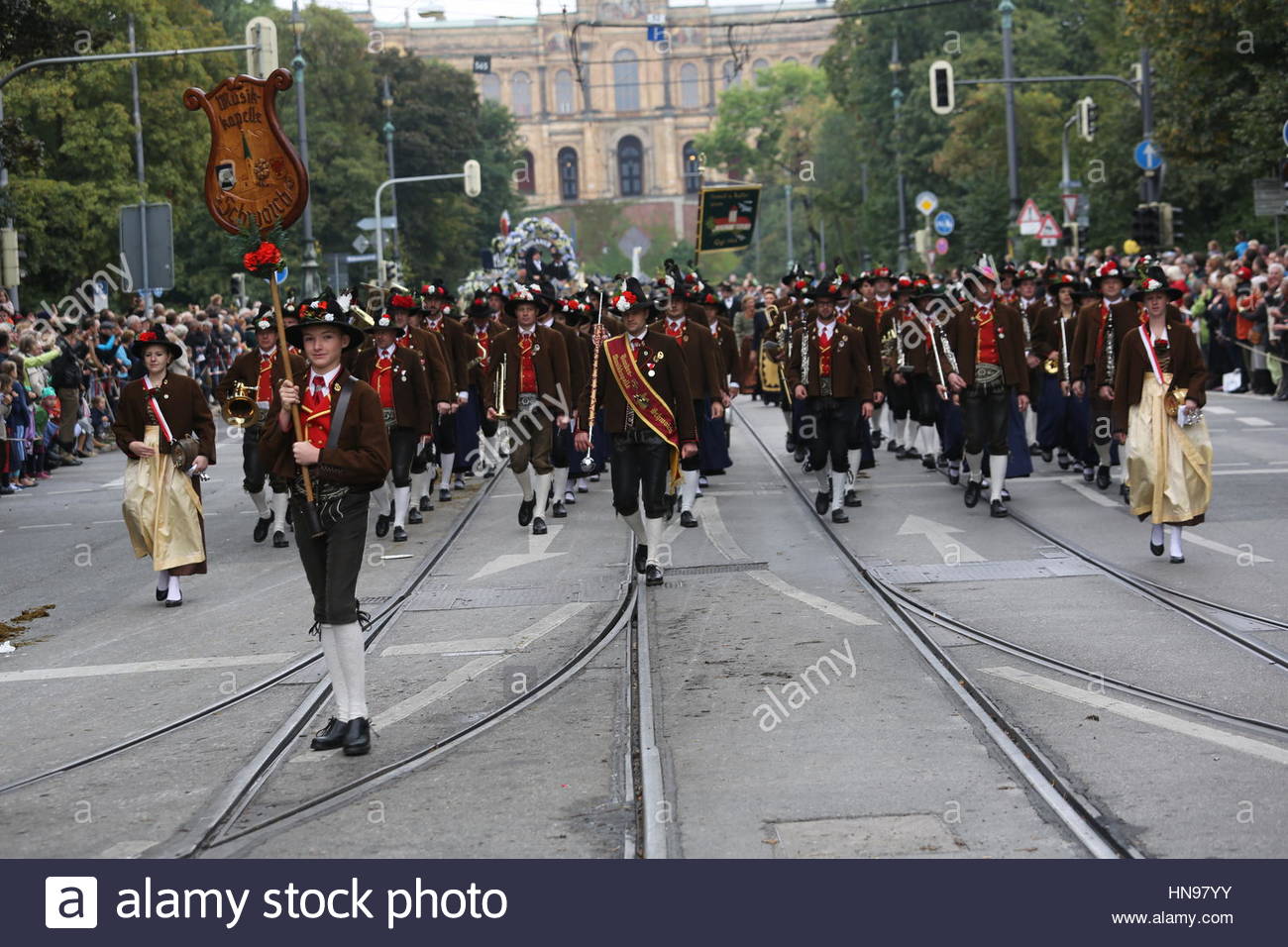 Flags at the traditional costume parade for the munich oktoberfest hi ...