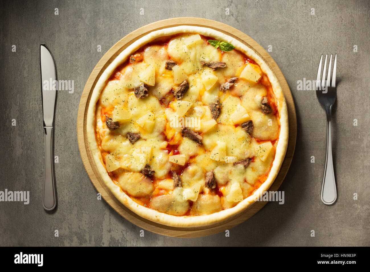 italian pizza at table background Stock Photo - Alamy