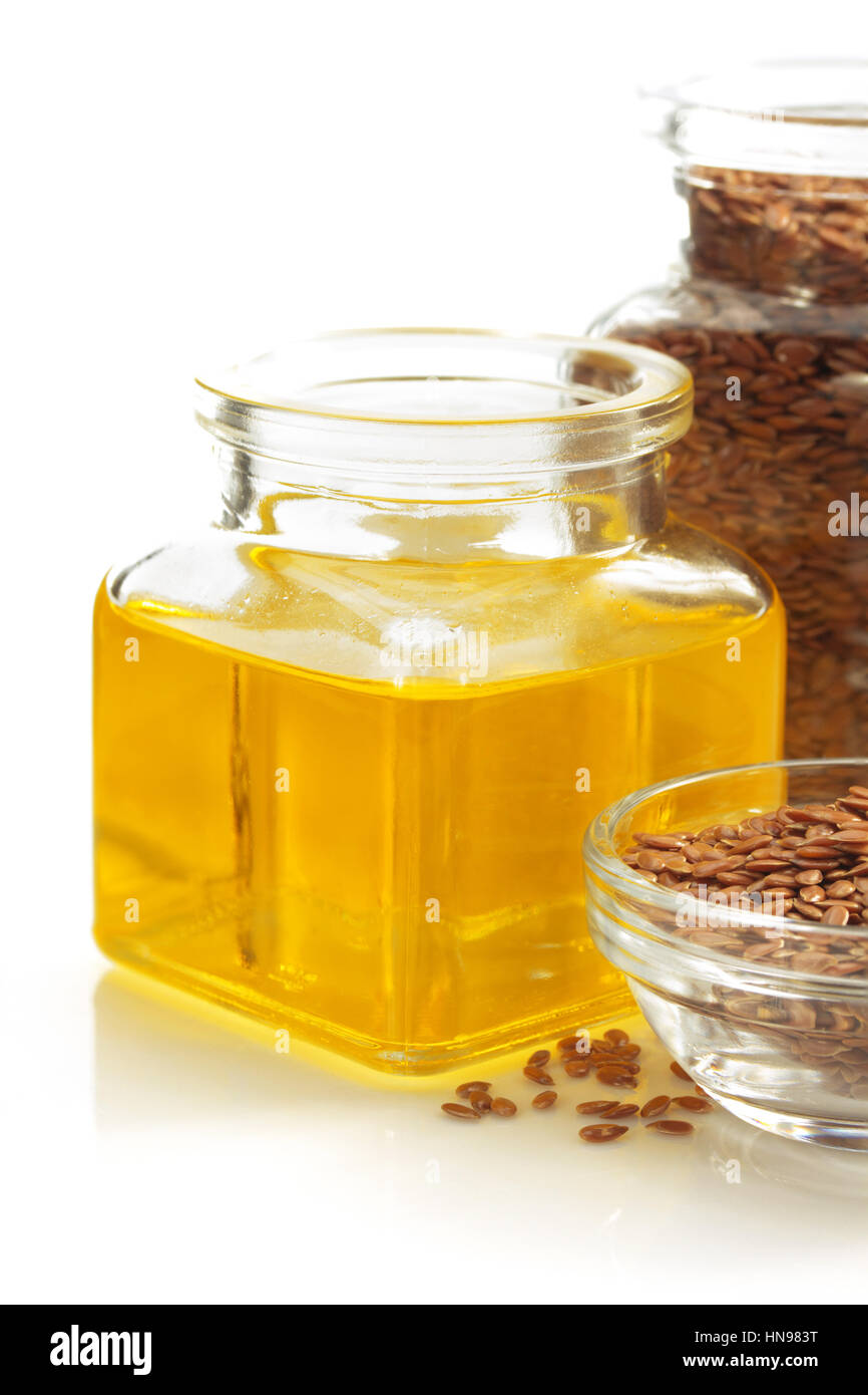 linseed oil in bottle isolated on white background Stock Photo - Alamy