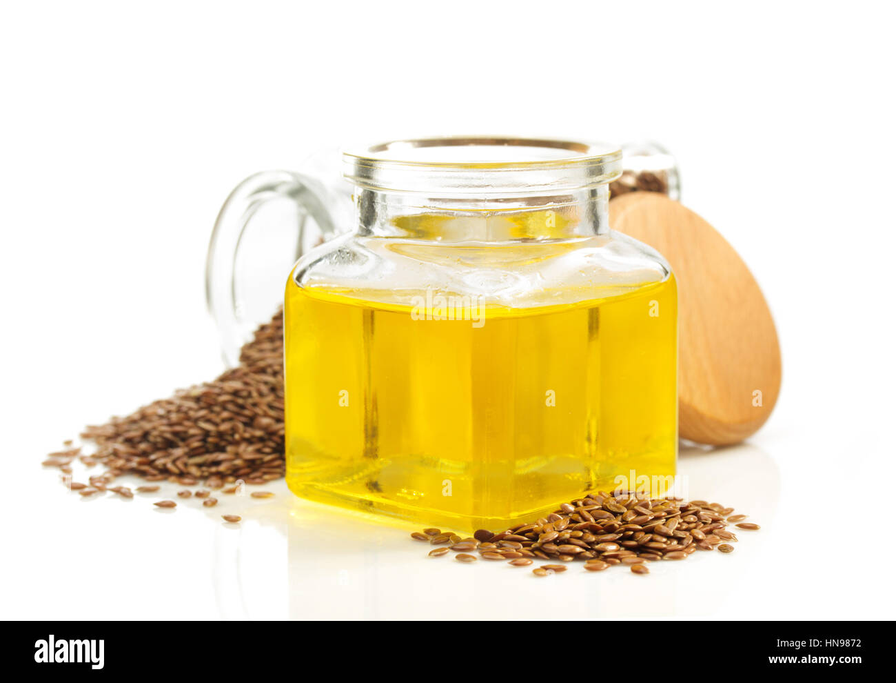 linseed oil in bottle isolated on white background Stock Photo - Alamy