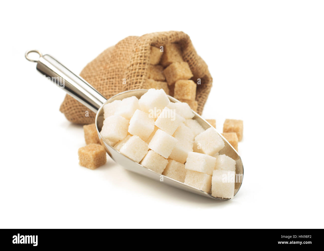 sugar cubes in scoop isolated on white background Stock Photo - Alamy