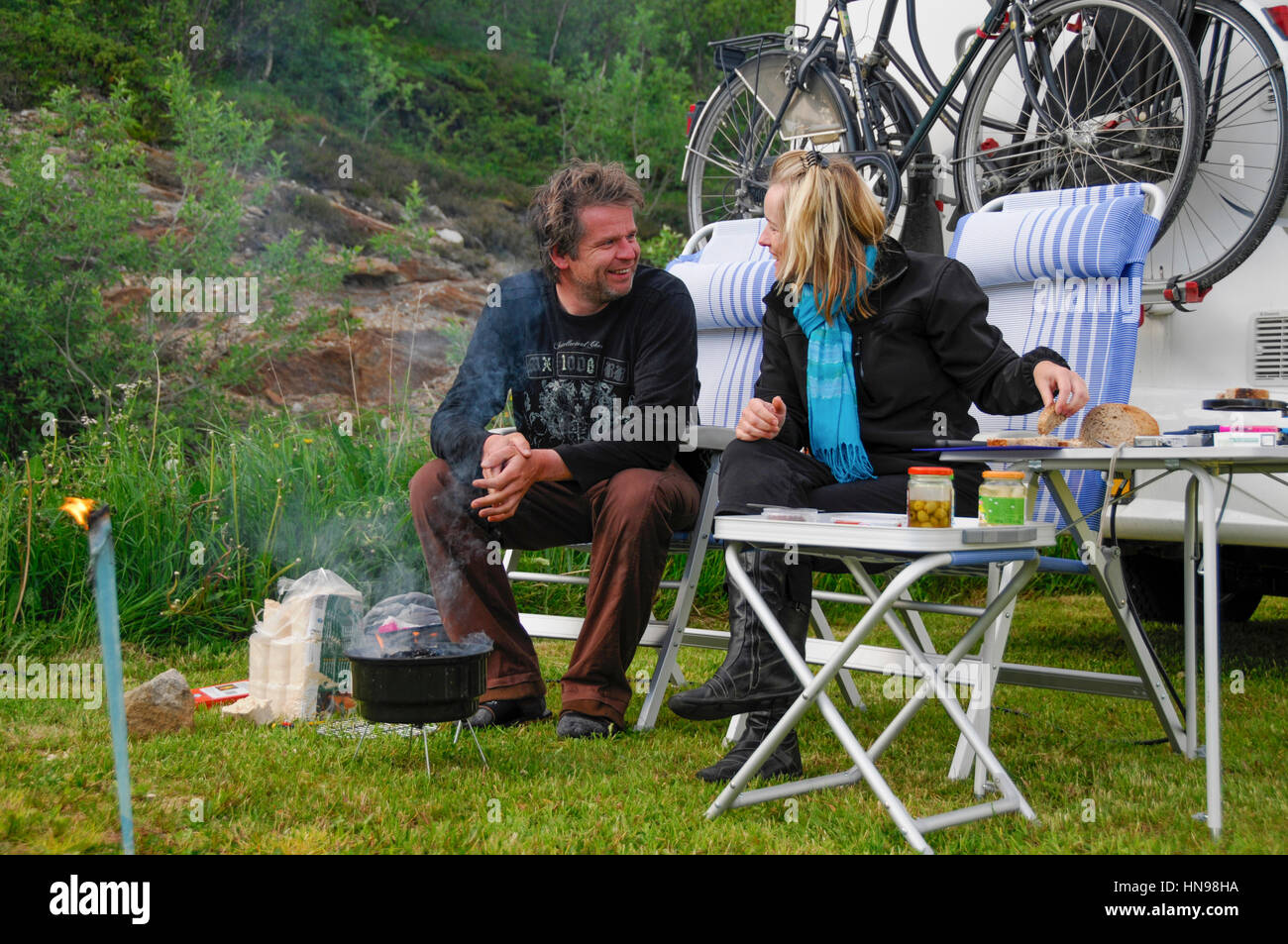 Camping chair woman bbq hi-res stock photography and images - Alamy
