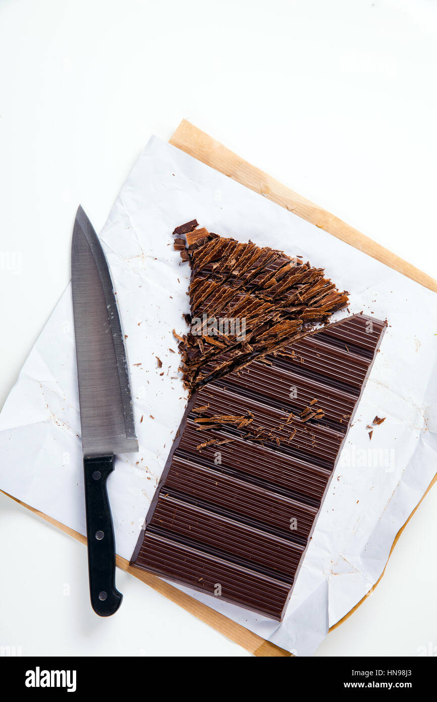 broken chocolate bar and knife chef Stock Photo - Alamy