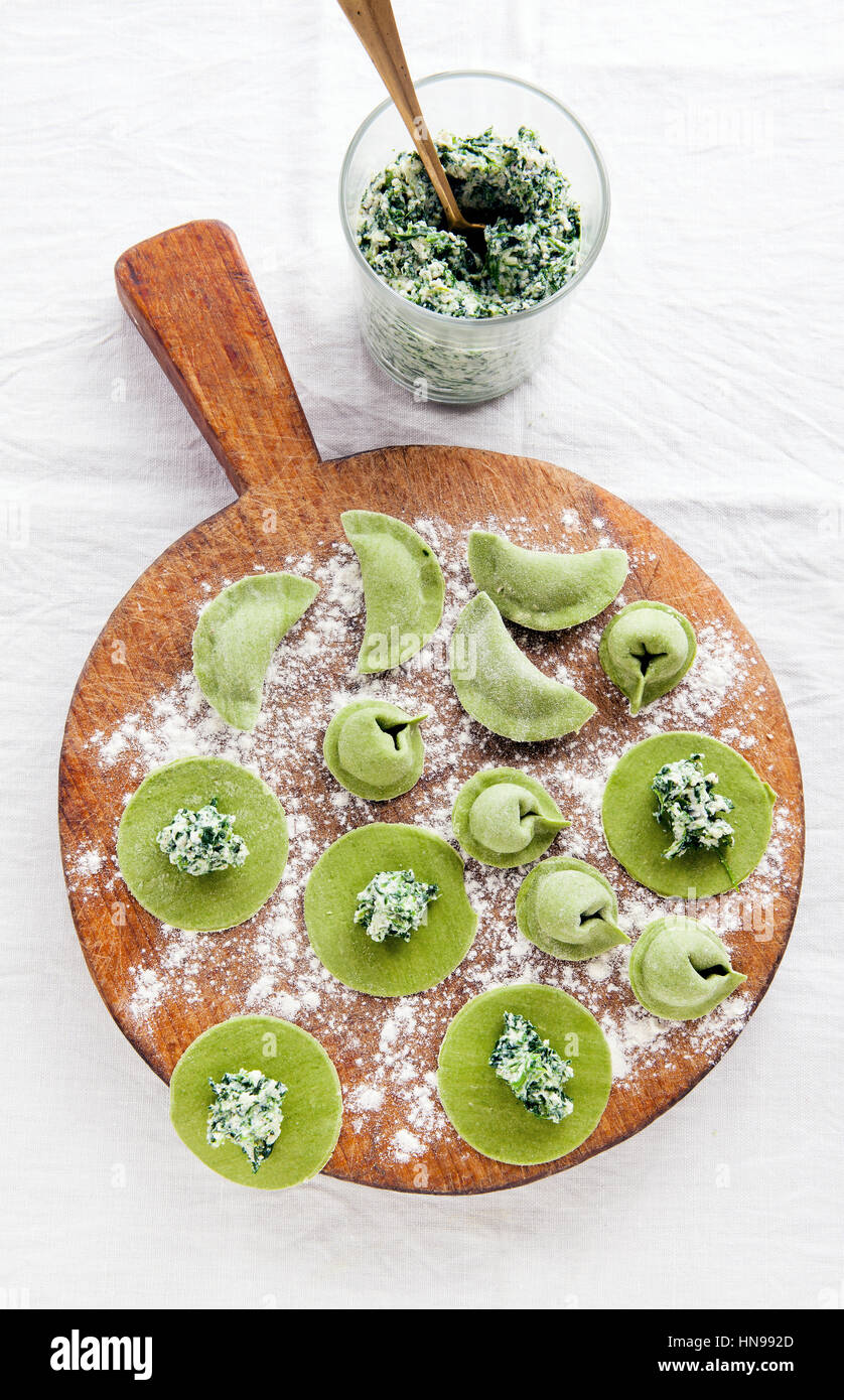 Green stuffed pasta. different types of filled pasta Stock Photo - Alamy