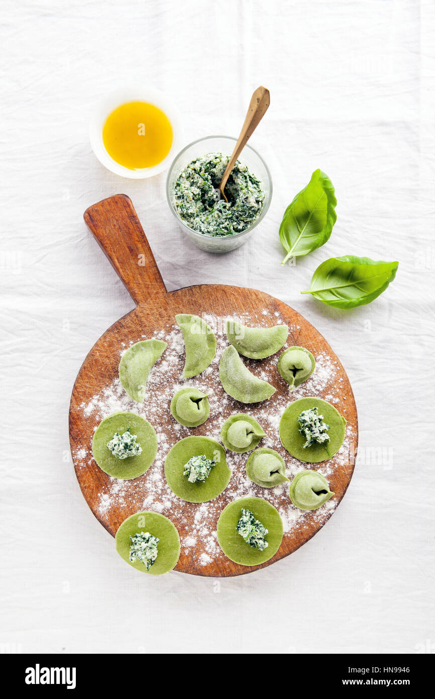 gradual preparing of ravioli. various forms of filled pasta. step by ...