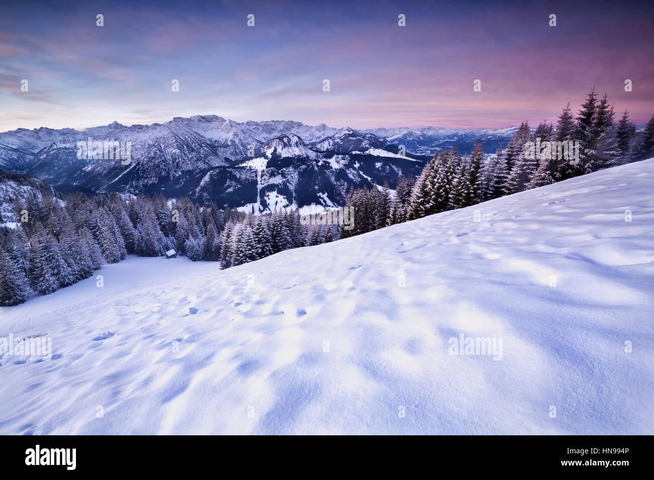 pink sunrise in winter Alps, Germany Stock Photo - Alamy