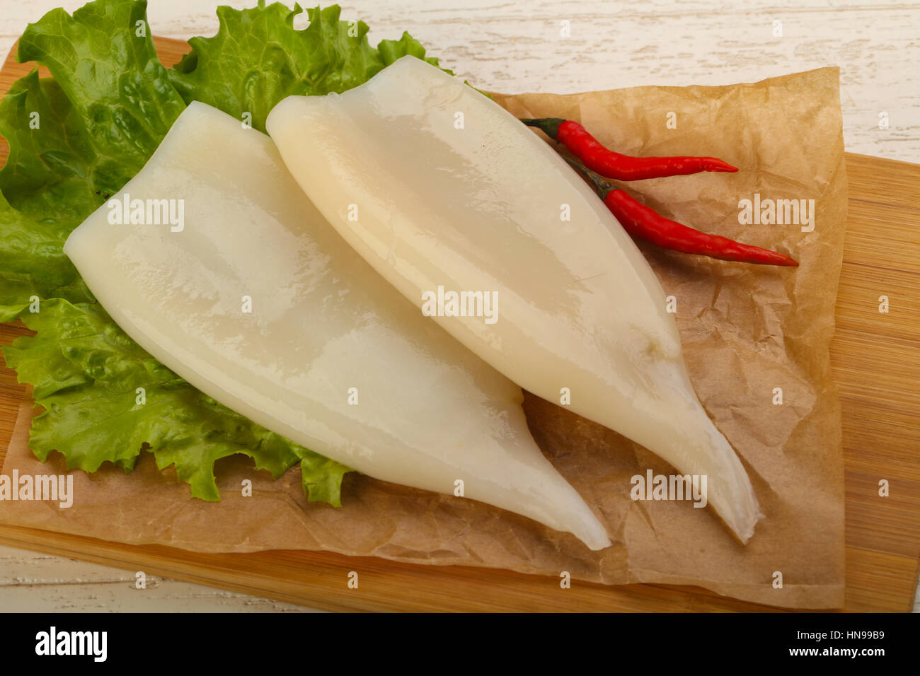 Raw squid fillet ready for cooking Stock Photo - Alamy