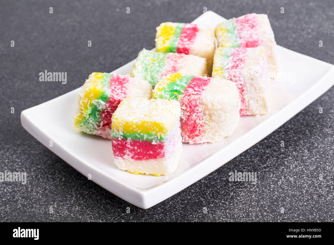Eastern sweets Turkish delight in color coconut chips Stock Photo - Alamy