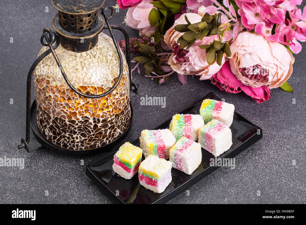 Eastern sweets Turkish delight in color coconut chips Stock Photo - Alamy