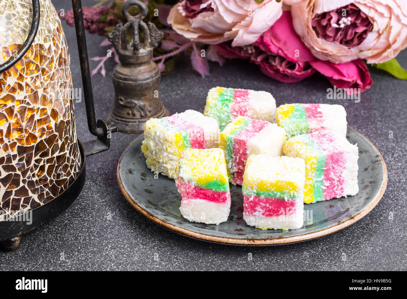 Eastern sweets Turkish delight in color coconut chips Stock Photo - Alamy