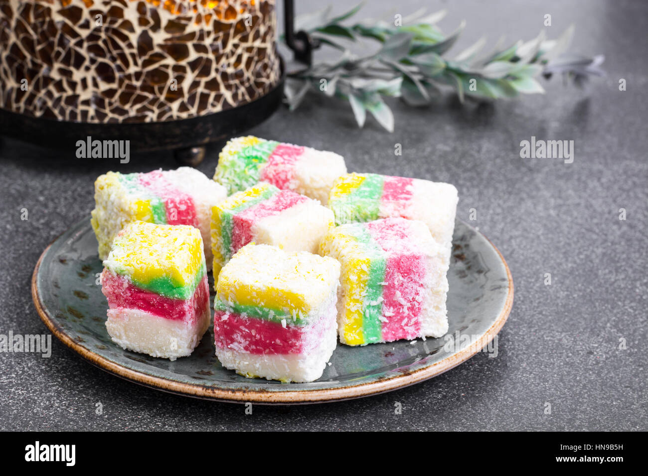 Eastern sweets Turkish delight in color coconut chips Stock Photo - Alamy
