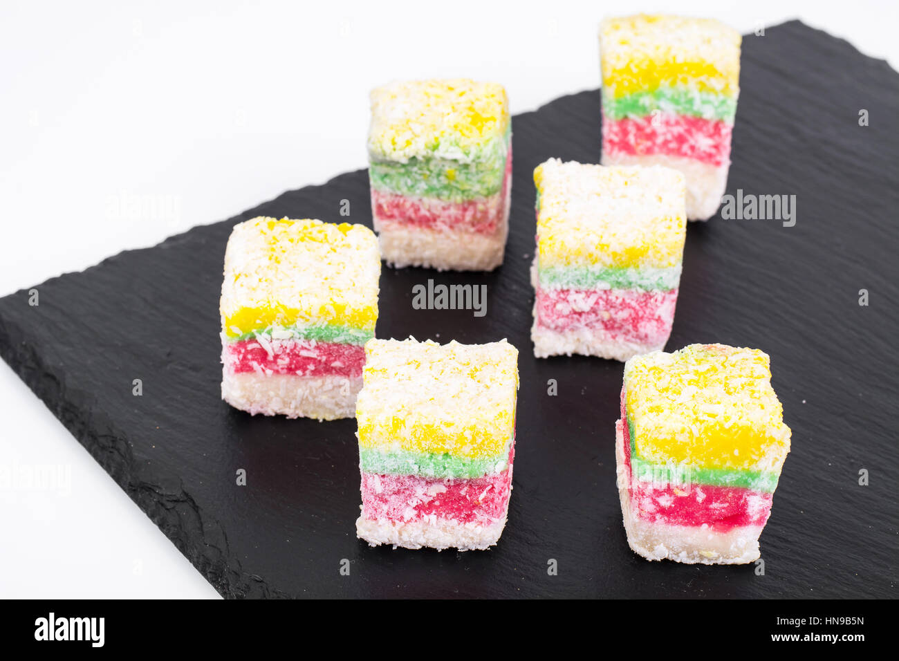 Eastern sweets Turkish delight in color coconut chips Stock Photo - Alamy