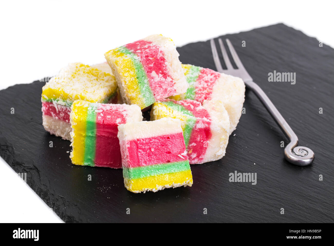 Eastern sweets Turkish delight in color coconut chips Stock Photo - Alamy