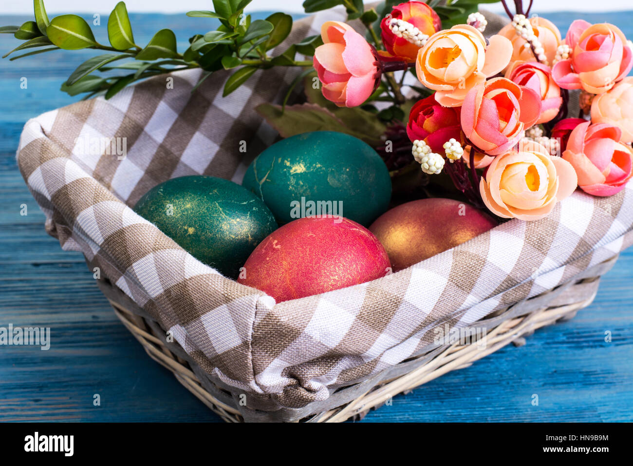 Wicker basket with Easter symbols Stock Photo - Alamy