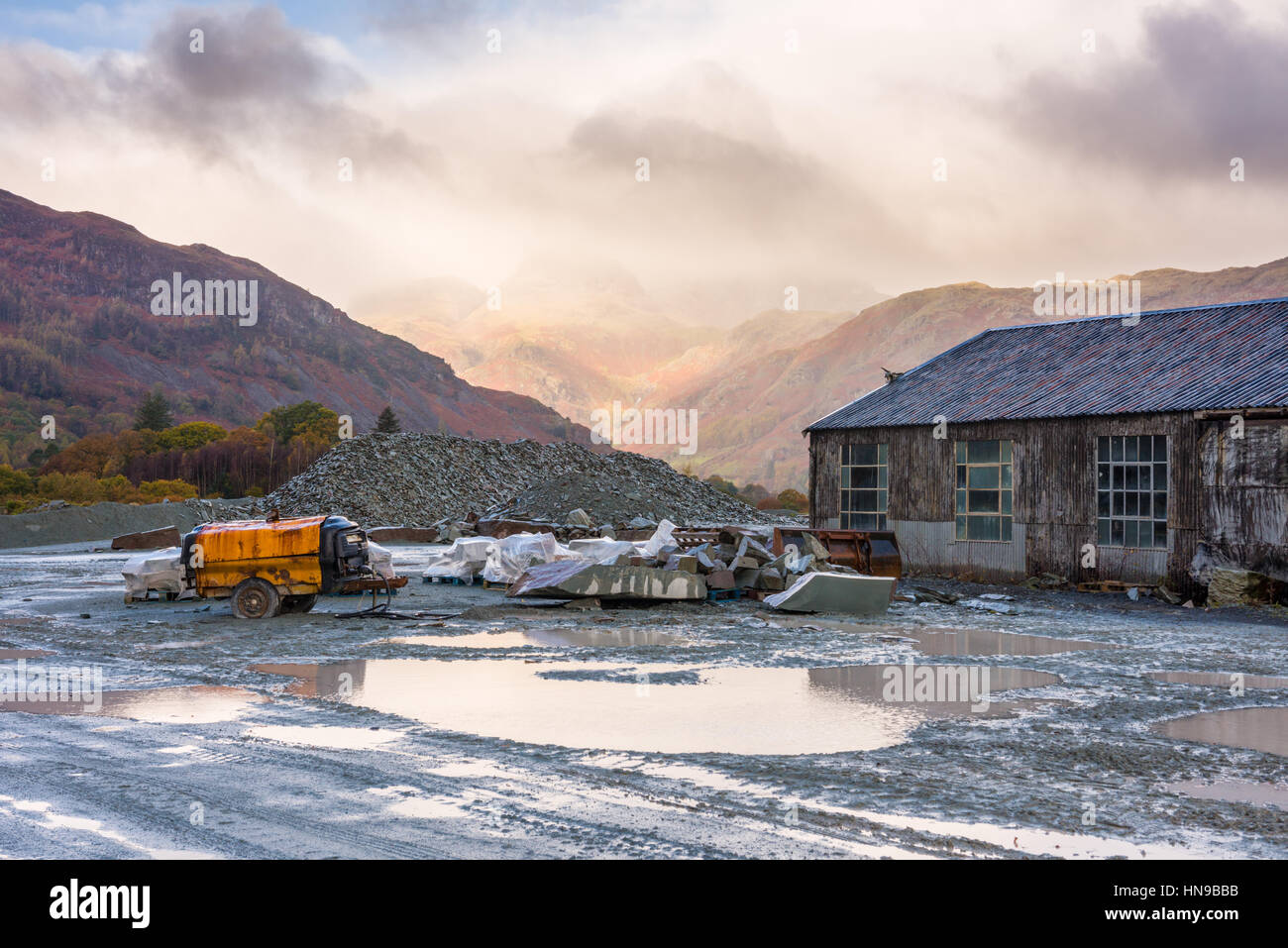 Elterwater Quarry with Lingmoor and the Langdale Pikes beyond. Lake ...