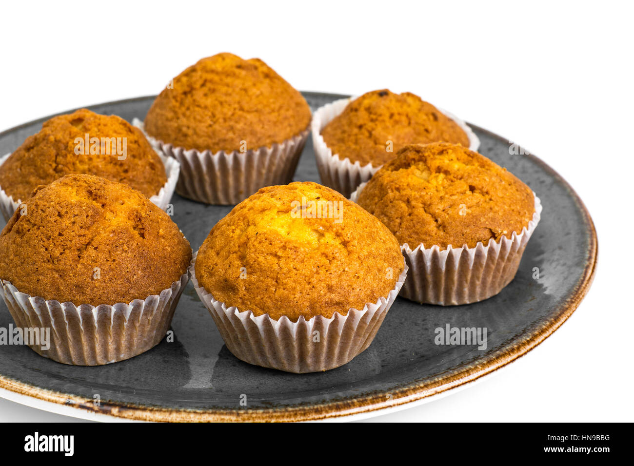 Vanilla mini muffins with chocolate topping Stock Photo - Alamy