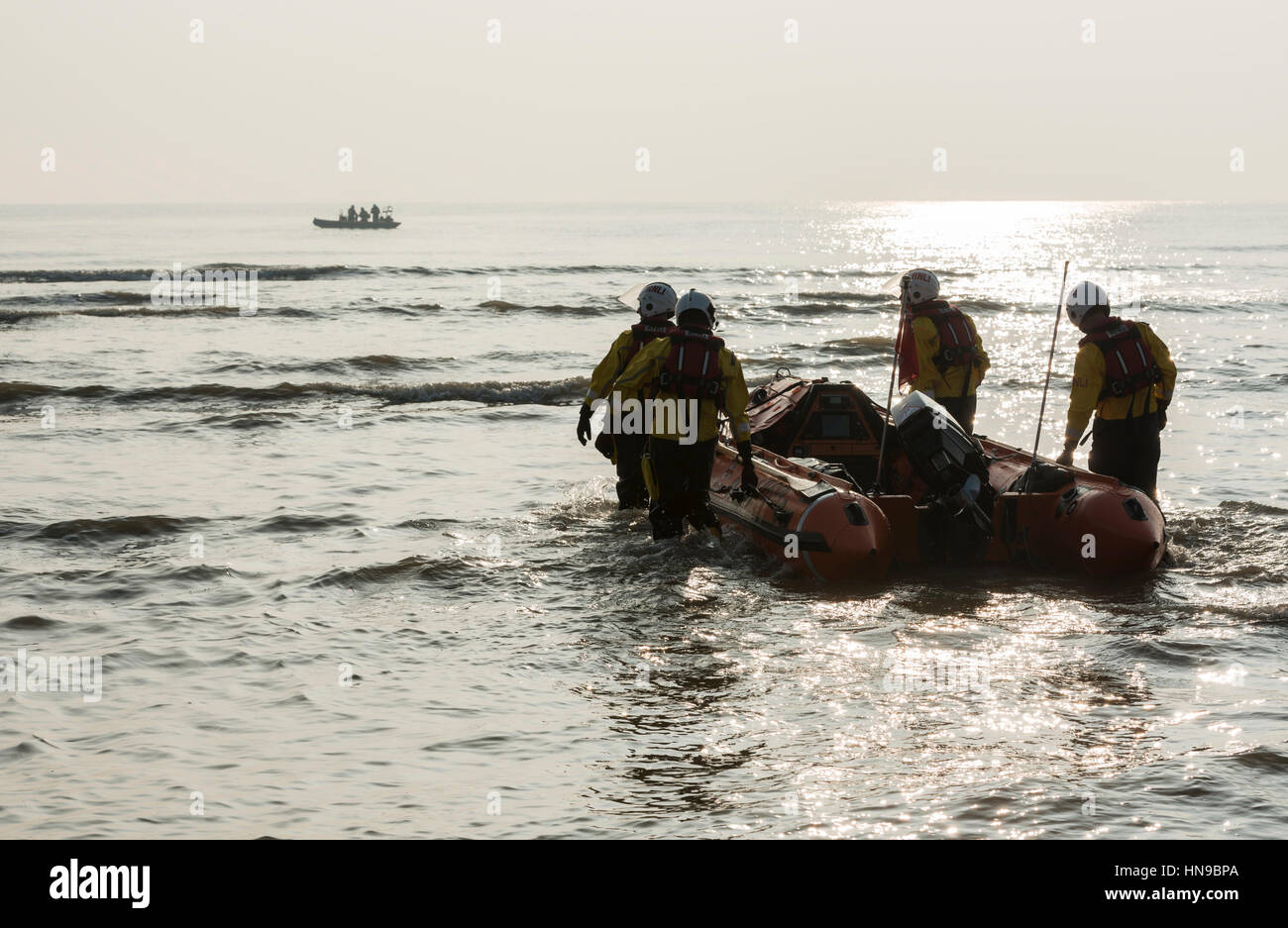 RNLI launch rescue RHIB form beach Stock Photo - Alamy