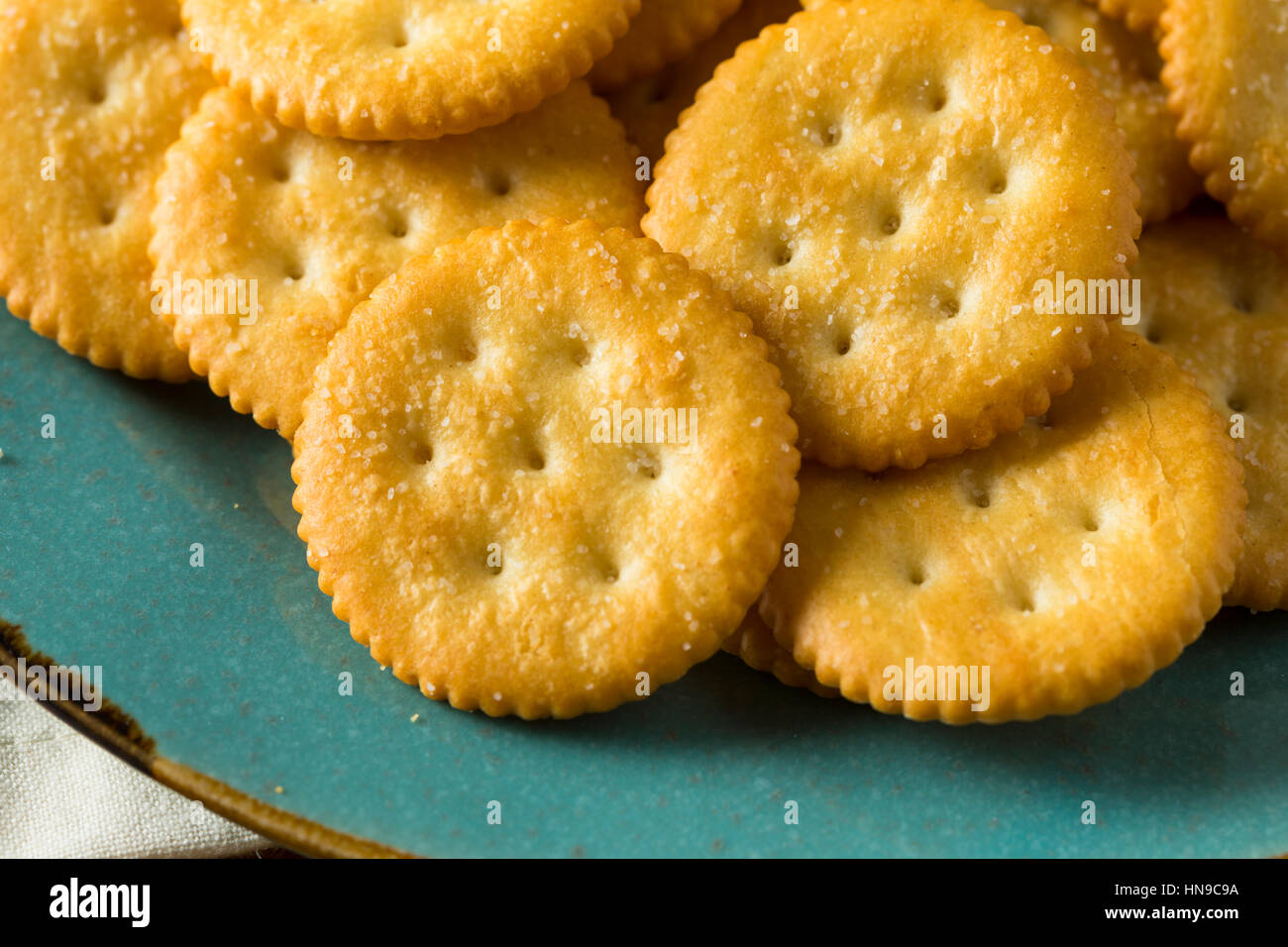 Round Salty Yellow Crackers Ready to Eat Stock Photo - Alamy