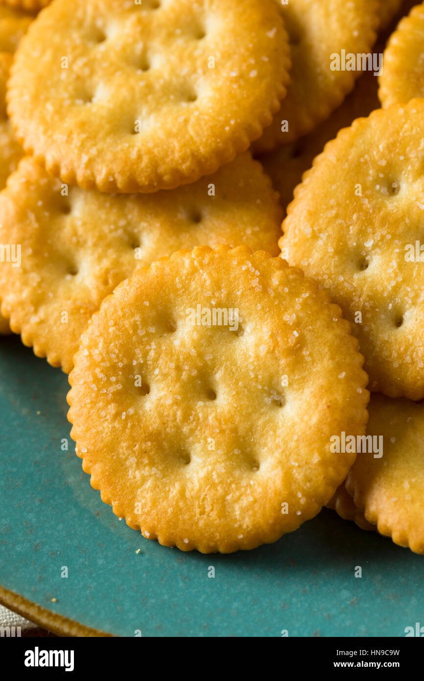 Round Salty Yellow Crackers Ready to Eat Stock Photo - Alamy