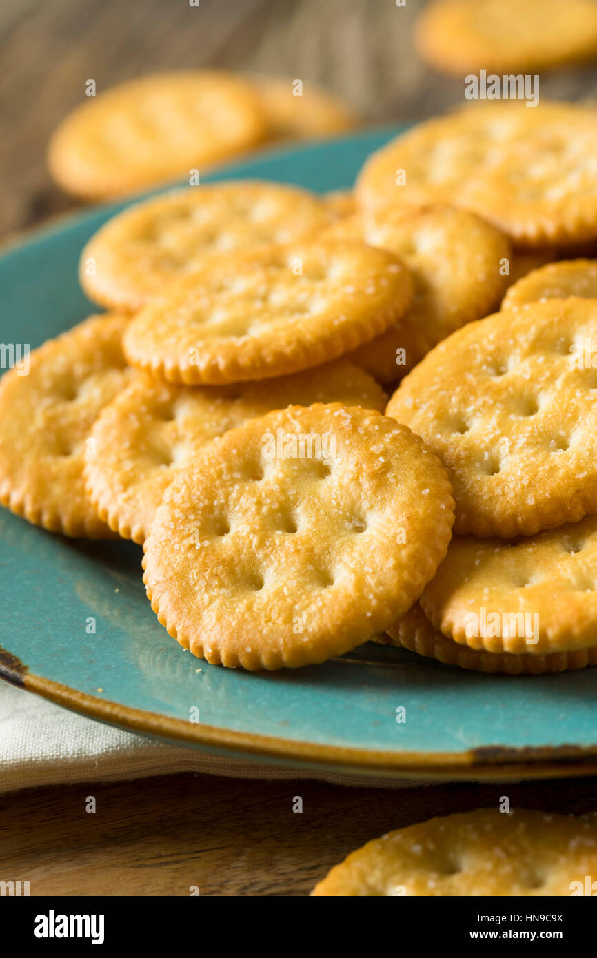 Round Salty Yellow Crackers Ready to Eat Stock Photo - Alamy