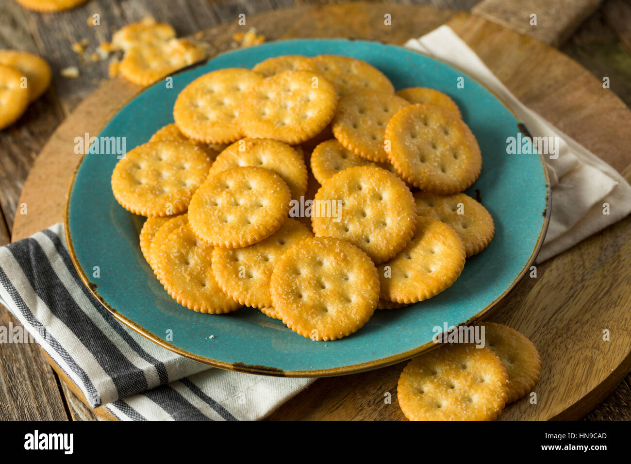 Round Salty Yellow Crackers Ready to Eat Stock Photo - Alamy
