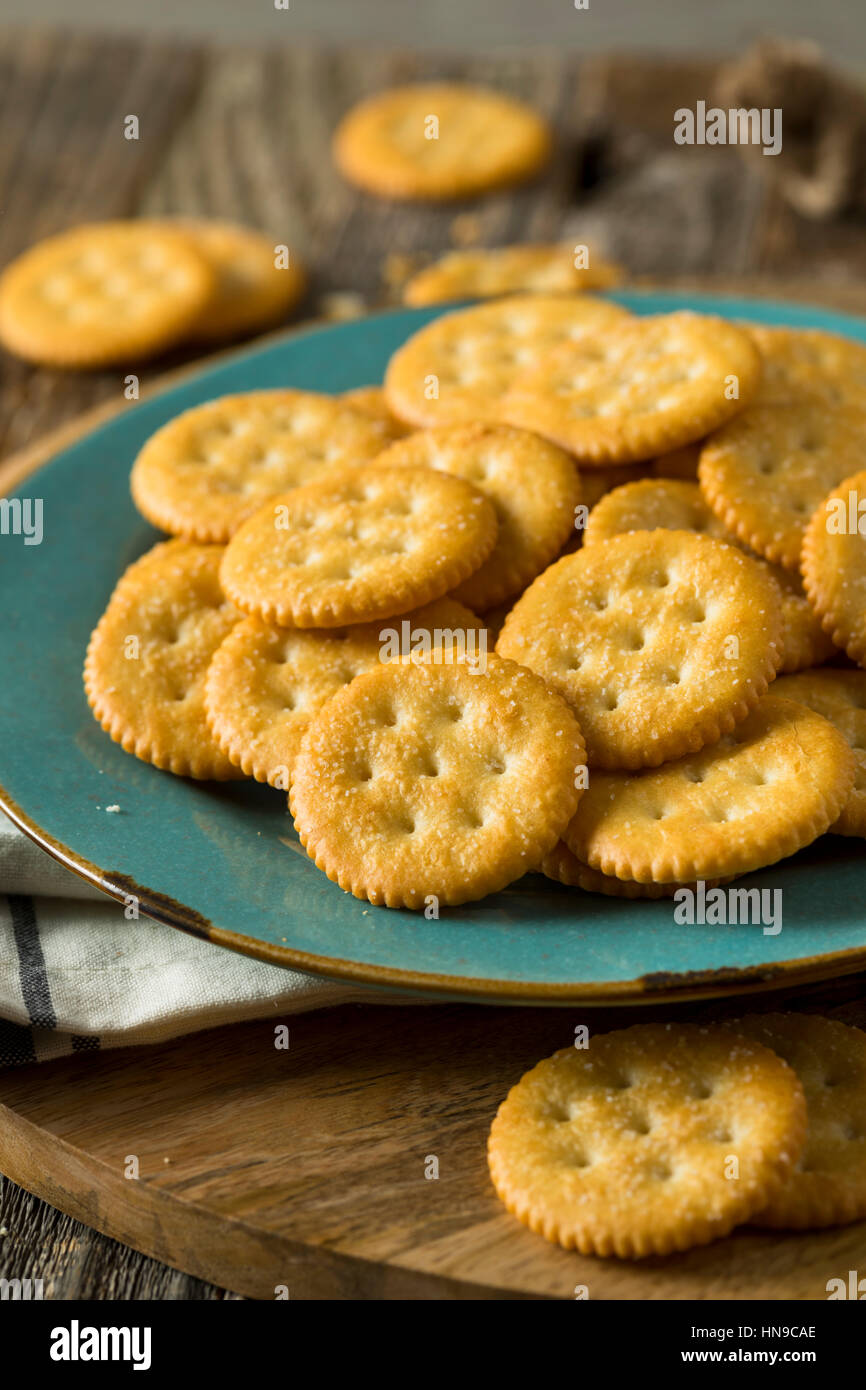 Round Salty Yellow Crackers Ready to Eat Stock Photo - Alamy