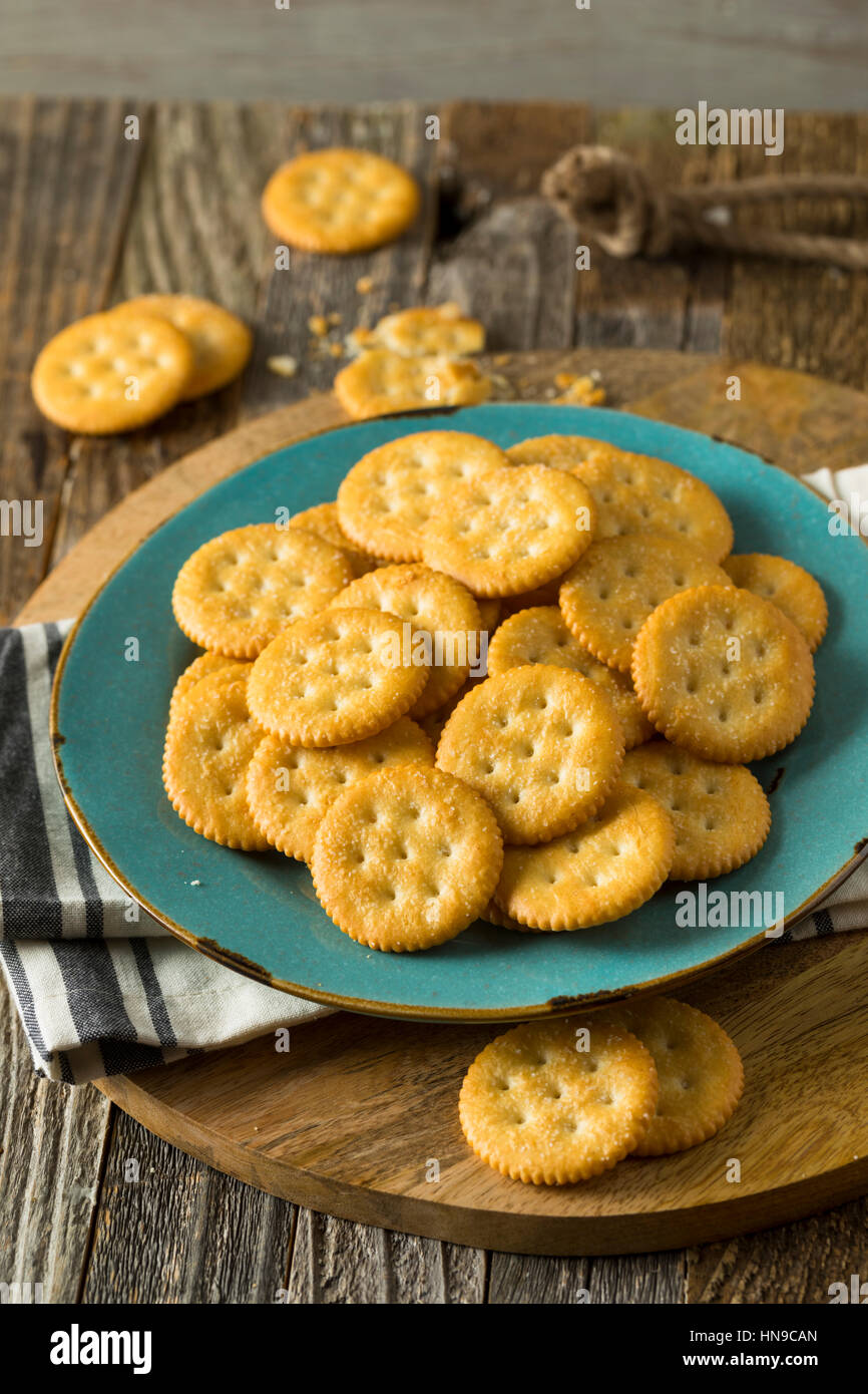 Round Salty Yellow Crackers Ready to Eat Stock Photo - Alamy