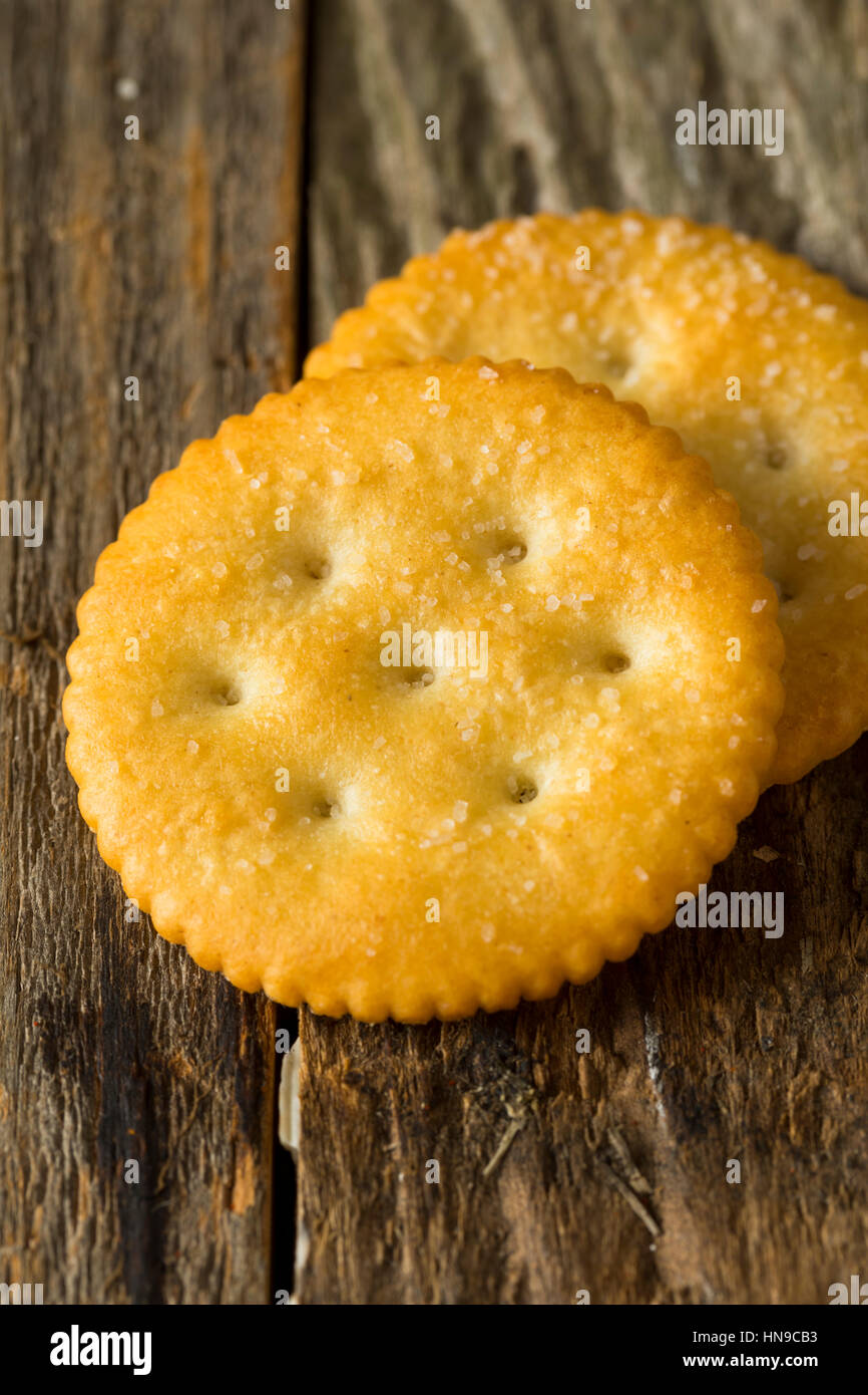 Round Salty Yellow Crackers Ready to Eat Stock Photo - Alamy