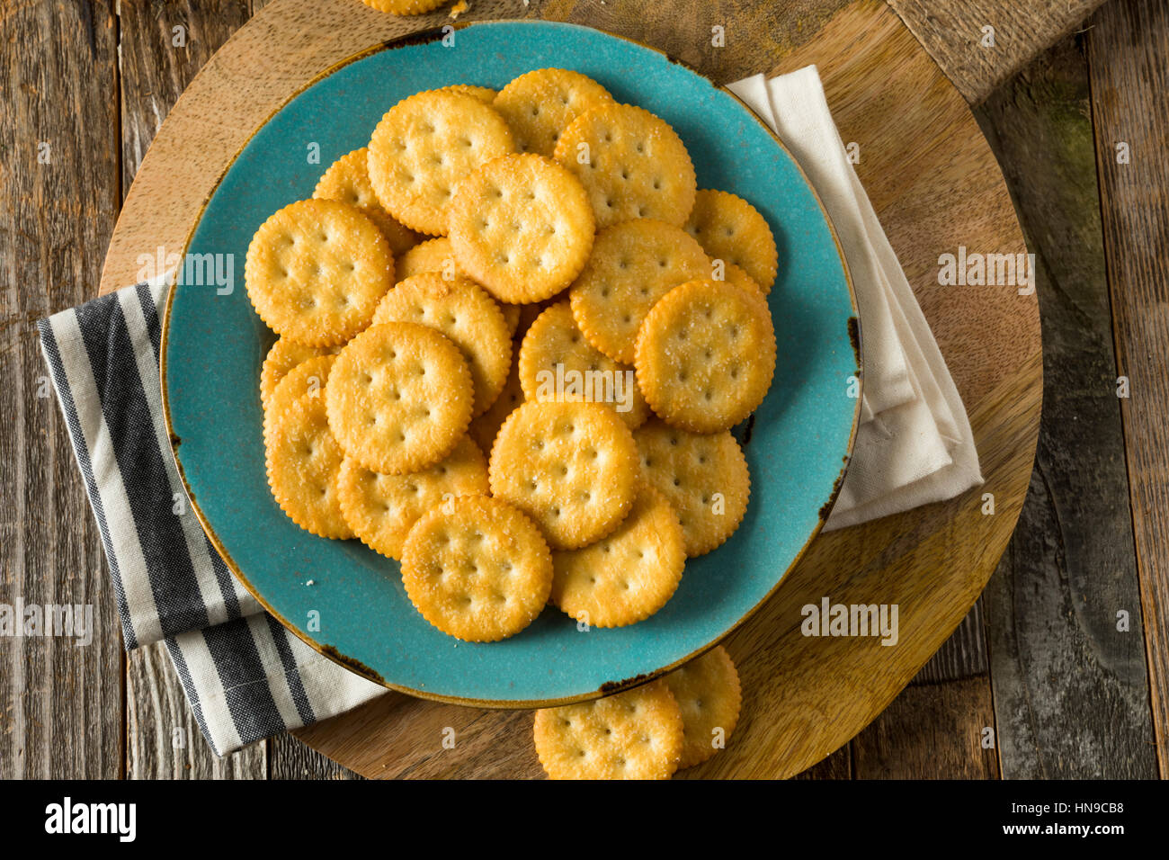 Round Salty Yellow Crackers Ready to Eat Stock Photo - Alamy