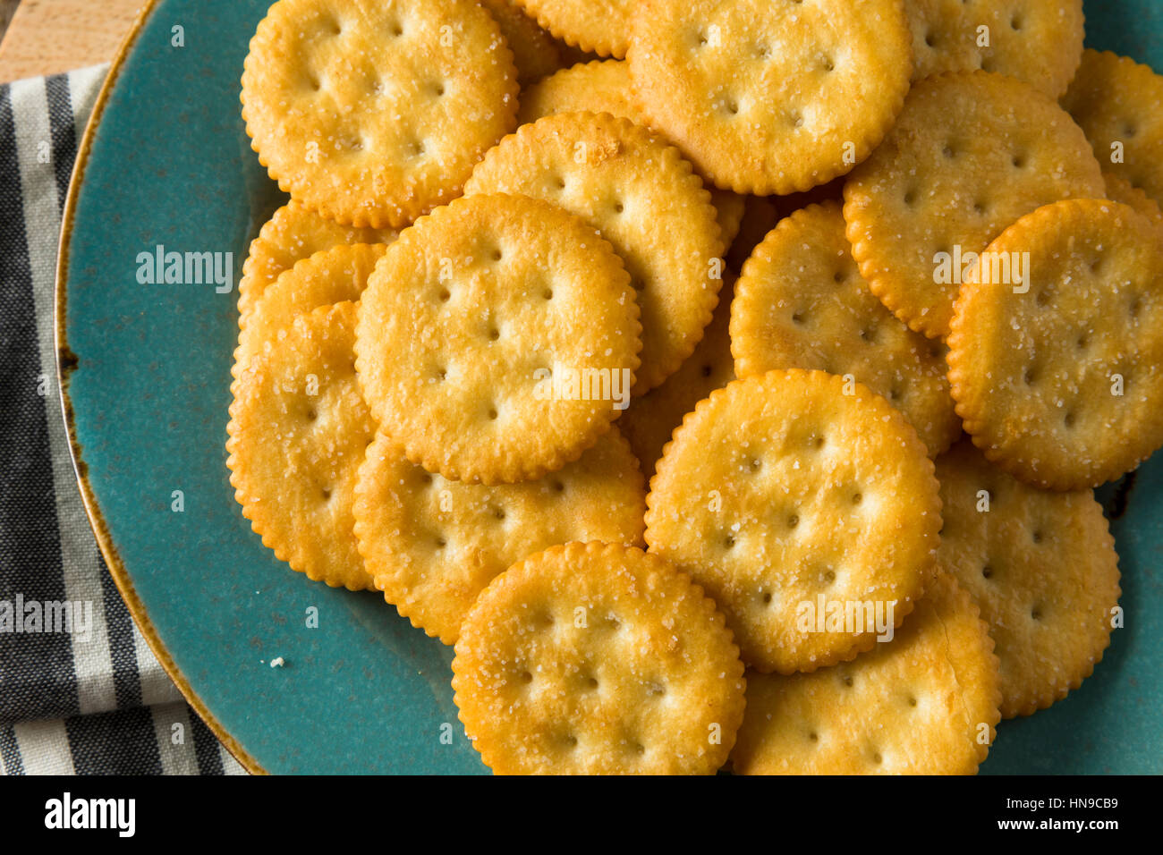 Round Salty Yellow Crackers Ready to Eat Stock Photo - Alamy