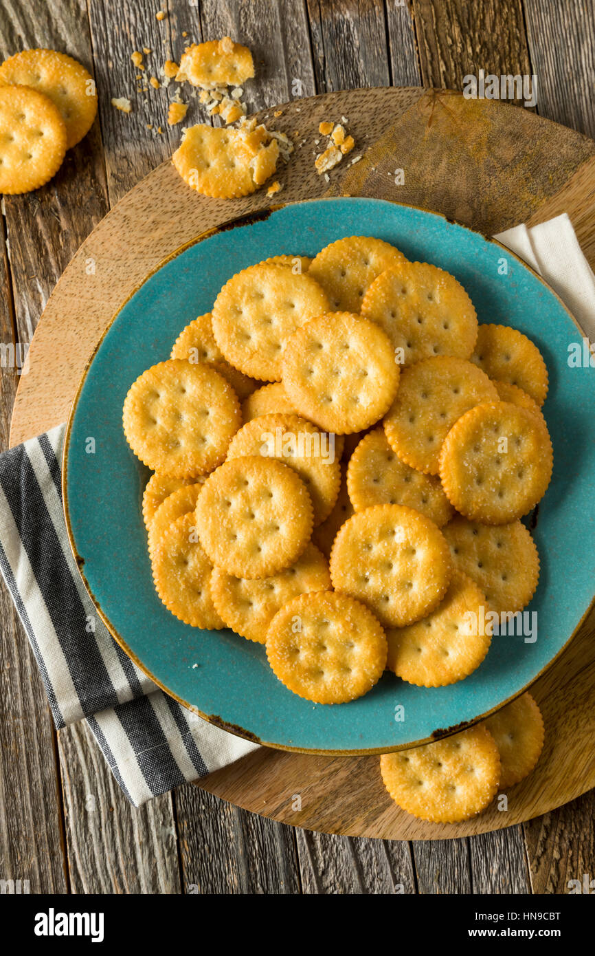 Round Salty Yellow Crackers Ready to Eat Stock Photo - Alamy