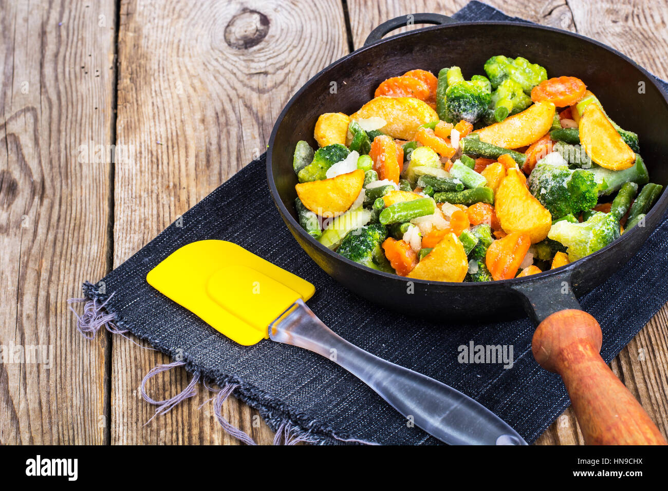 Frozen vegetables for frying in a pan Stock Photo - Alamy